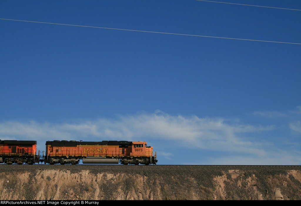 BNSF 9973 against the big NM sky.